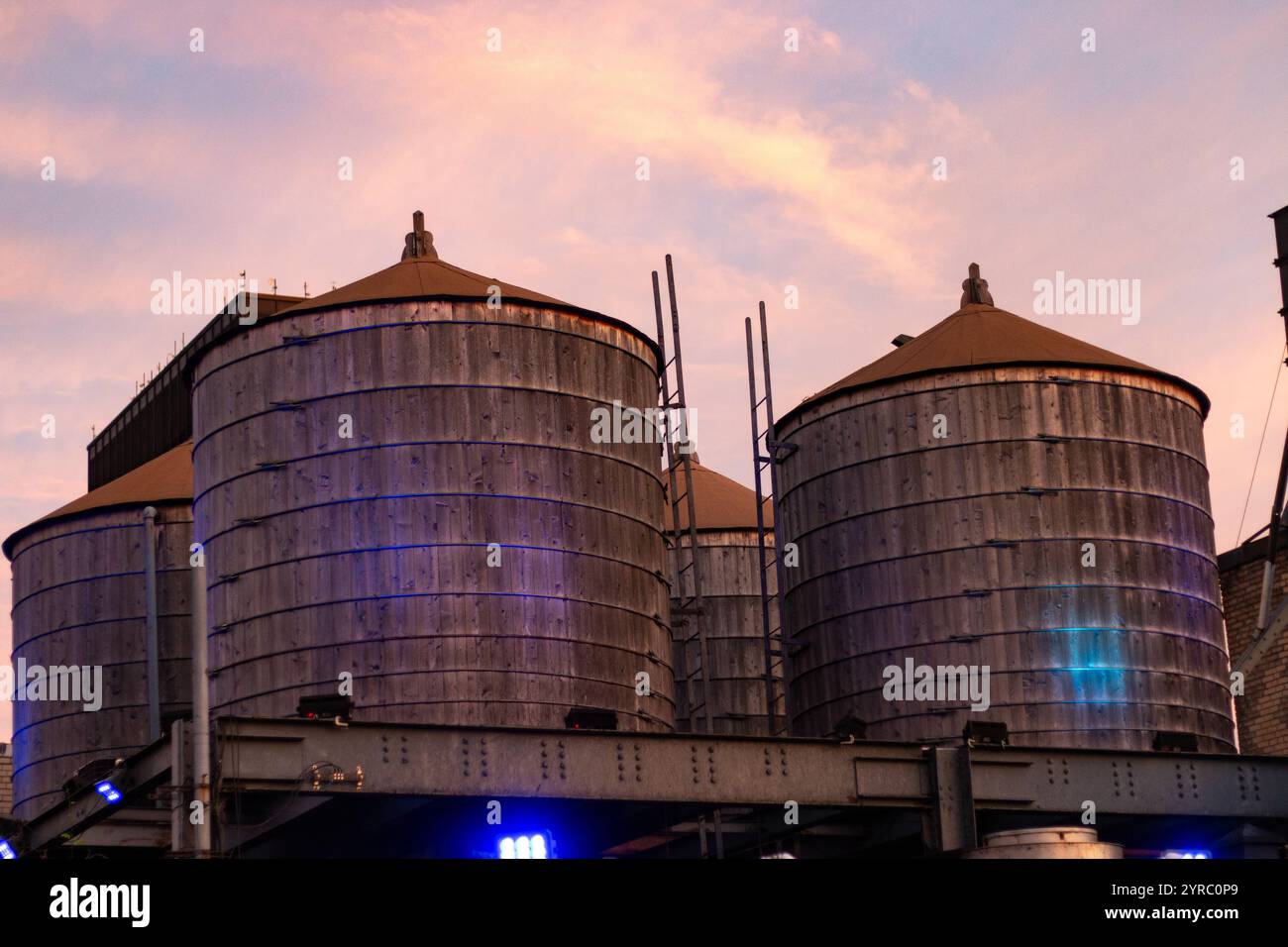 Cylindrical silos illuminated hi-res stock photography and images - Alamy