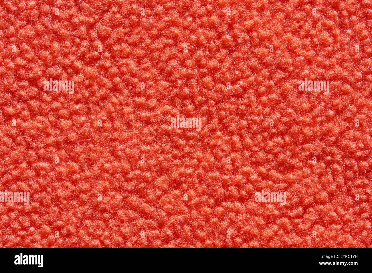 Red textured surface with soft fuzzy appearance and detailed fabric ...