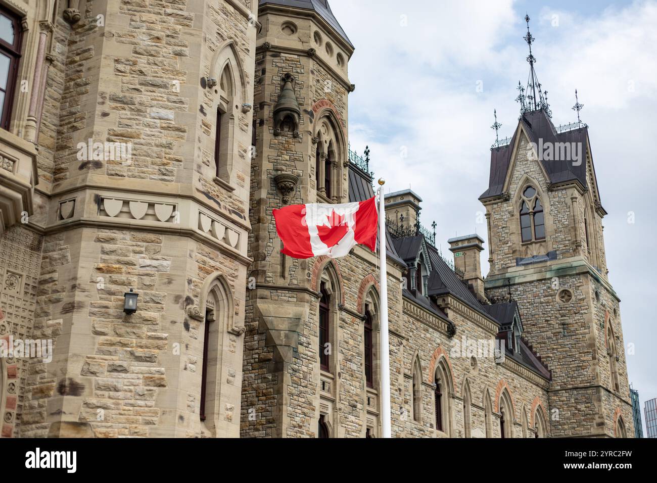 Canadian flag waving near the Parliament Hill building in Ottawa ...
