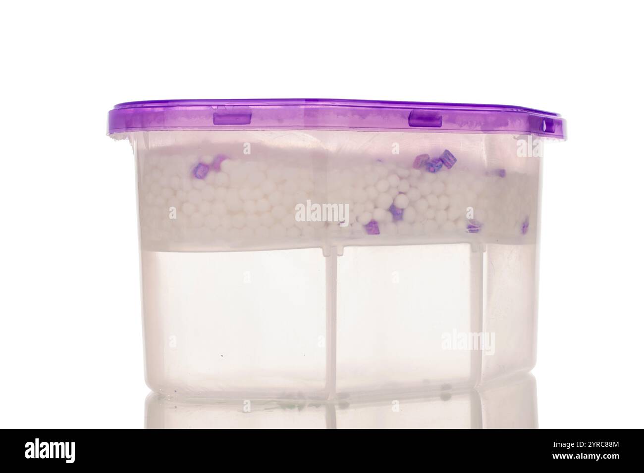 One plastic container, moisture absorber with filler, close-up ...