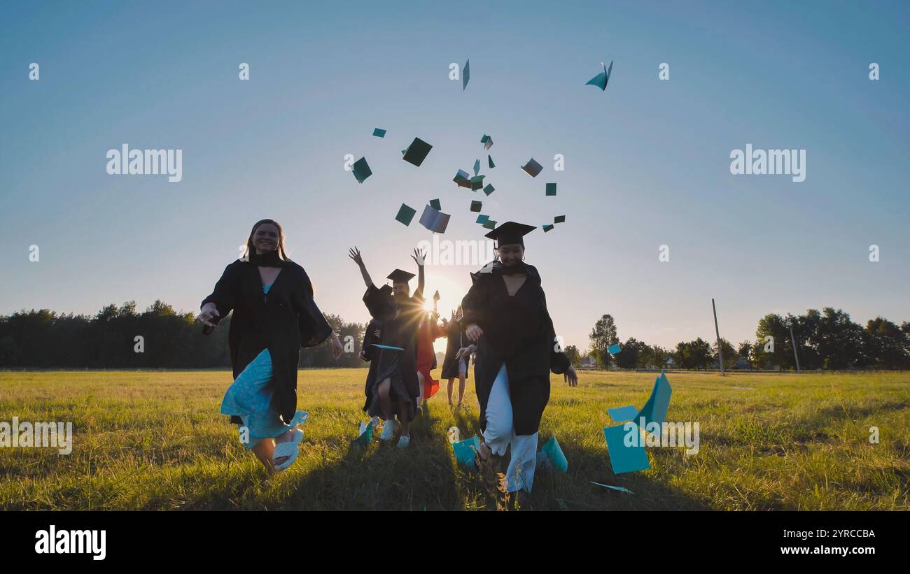 Graduates celebrating home young man hi-res stock photography and ...