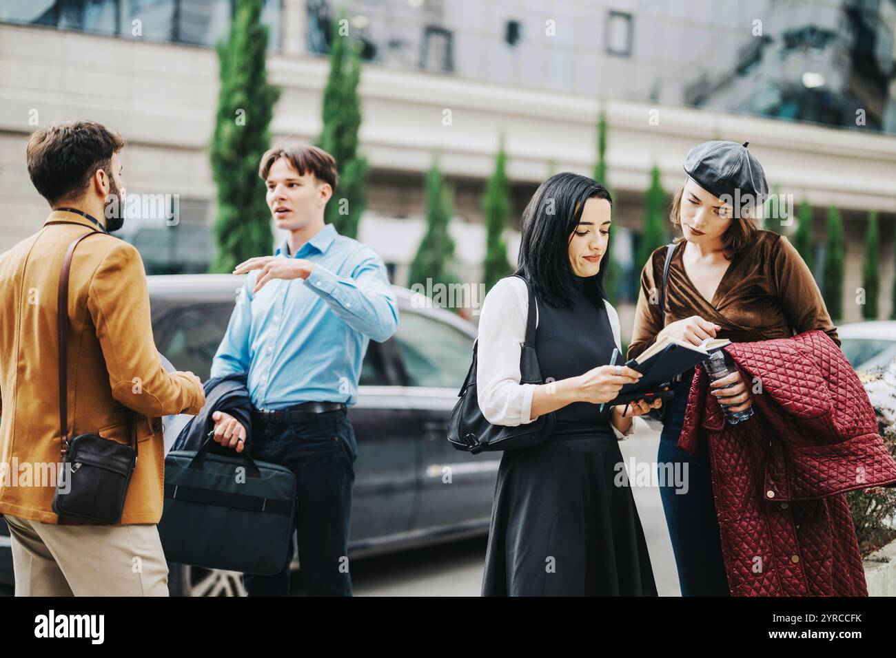 Business people networking in an urban city setting outdoors Stock ...