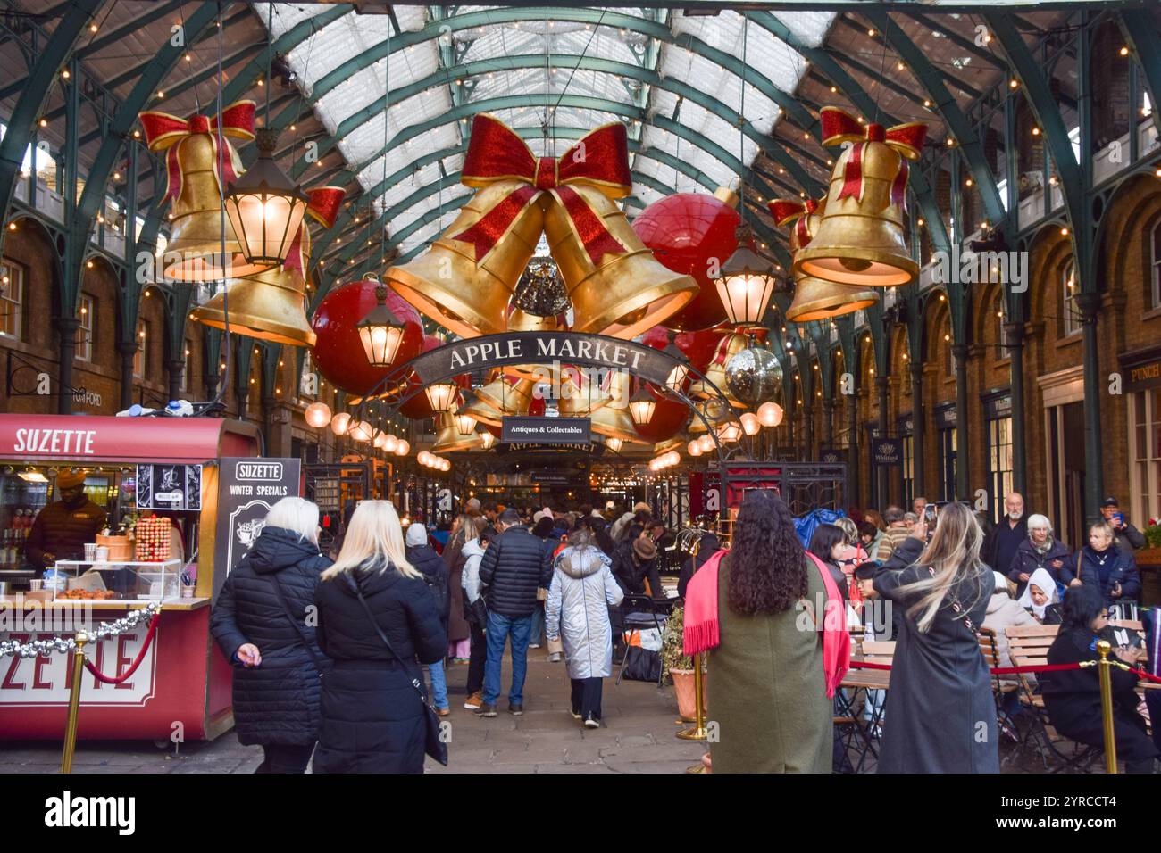 London, UK. 25th November 2024. People take photos of Christmas ...