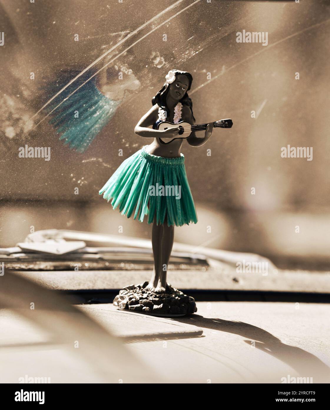 Dashboard hula girl, old school cars Stock Photo - Alamy