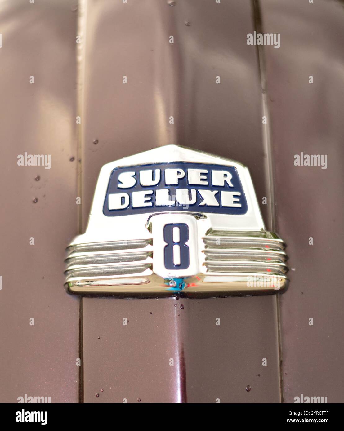 Packard Super Deluxe 8 Hood Badge Stock Photo - Alamy