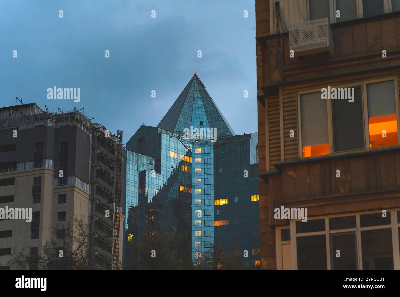Different types of buildings in Almaty city at night, Kazakhstan Stock ...