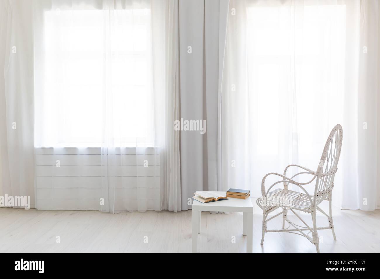 White vintage chair in living room interior with window Stock Photo - Alamy