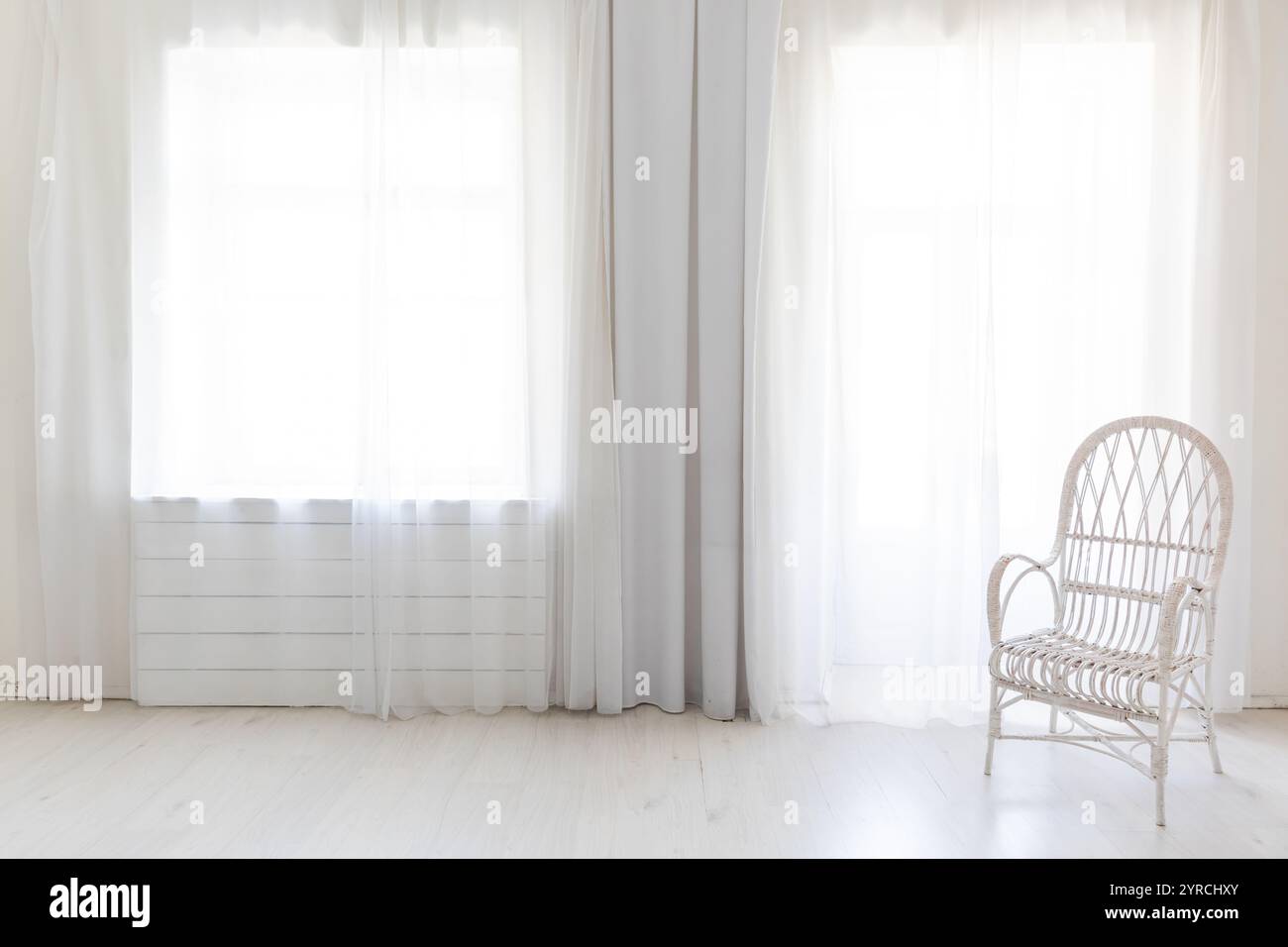 White vintage chair in living room interior with window Stock Photo - Alamy