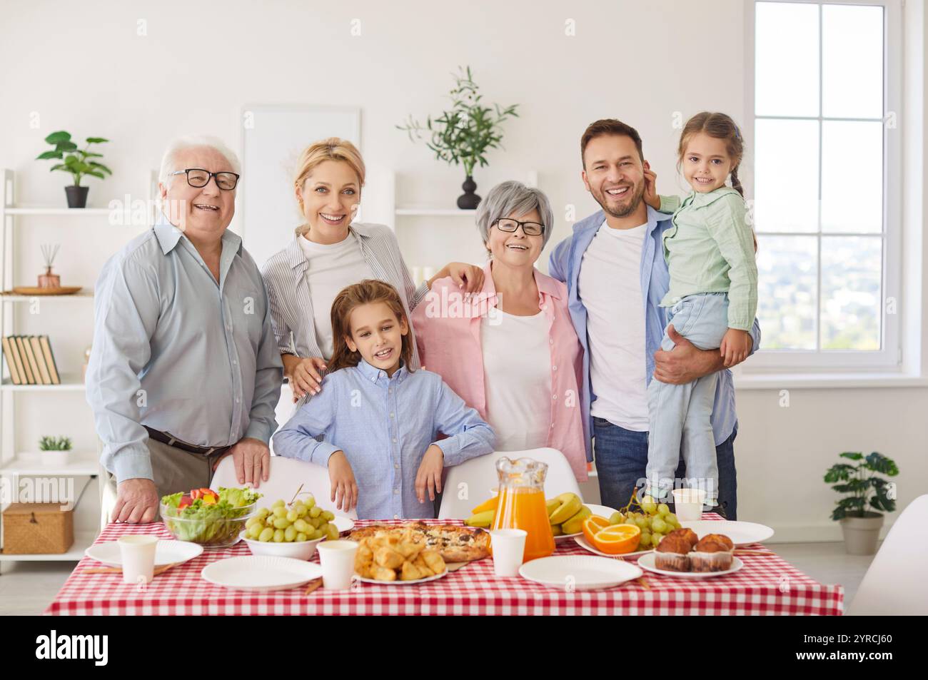 Happy family union portrait, festive meal at home, grandparents, mother ...