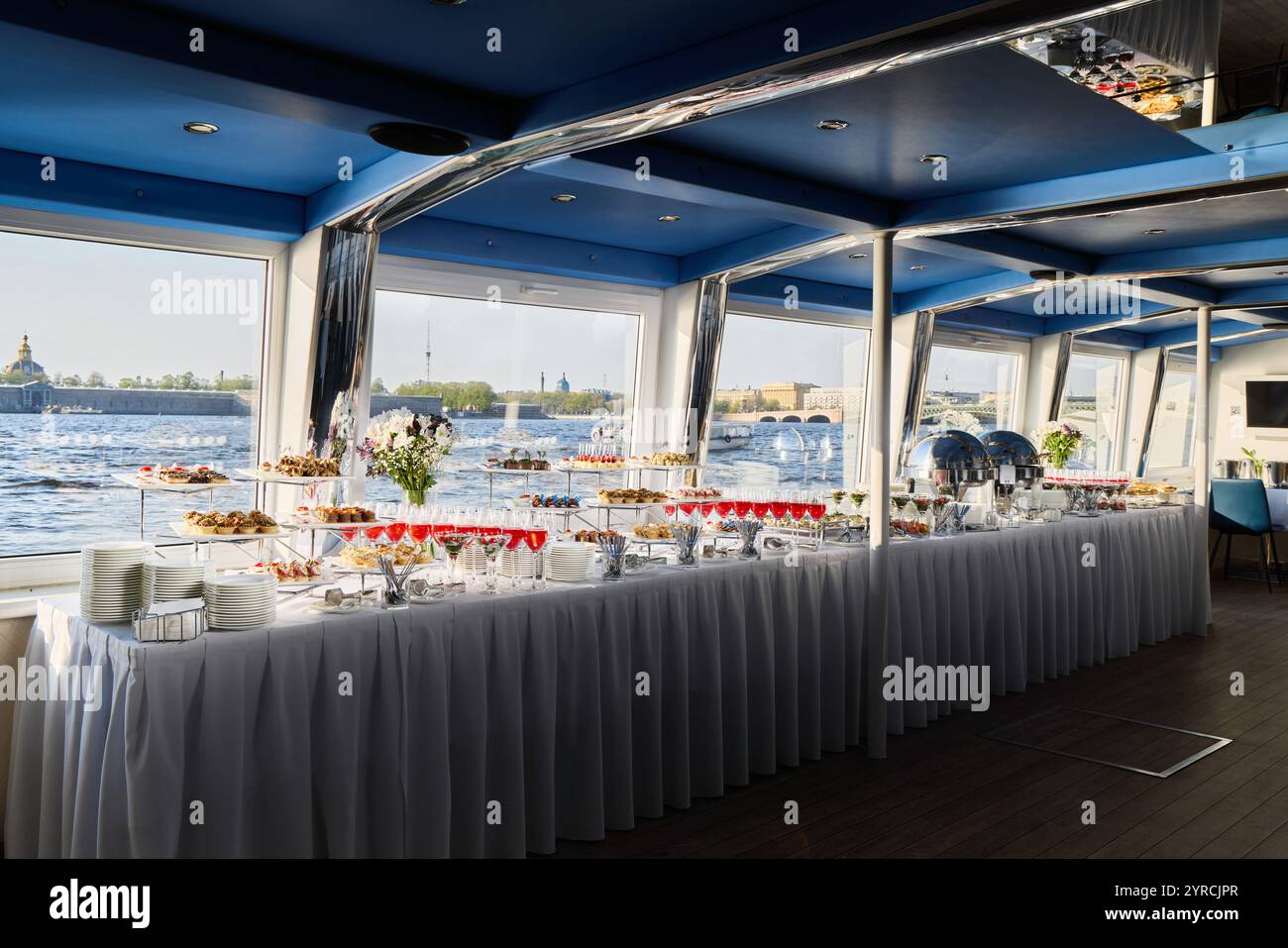 An Elegant Buffet Set Up on a Scenic Boat Providing Stunning Views and ...
