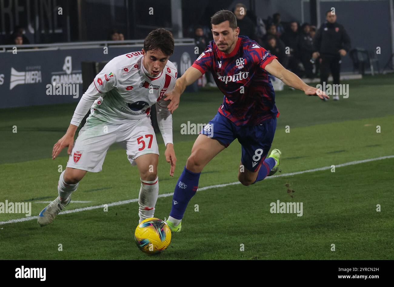 Monza’s Leonardo Colombo fights for the ball with Bologna's Remo ...