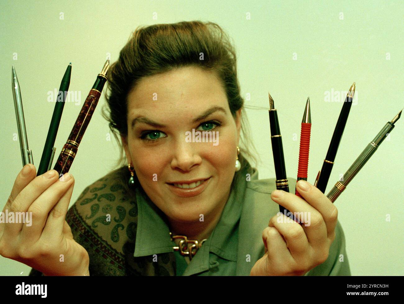 Jennifer Conner displays some of the upscale pens for sale at ...