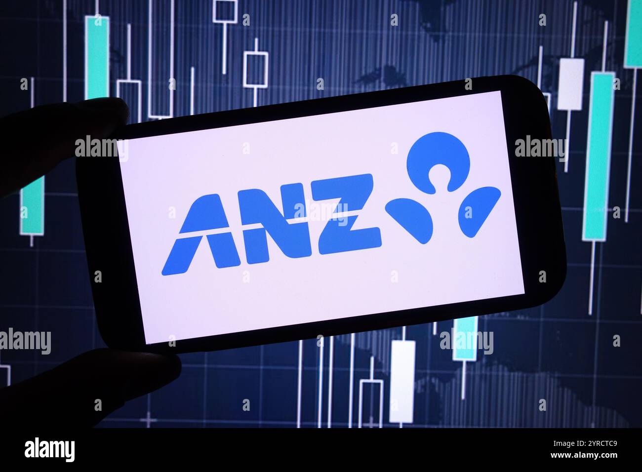 In this photo illustration, the ANZ Bank company logo is seen displayed ...