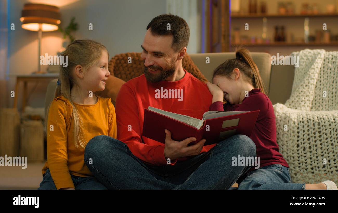 Caucasian family late night evening at home parent dad father man ...