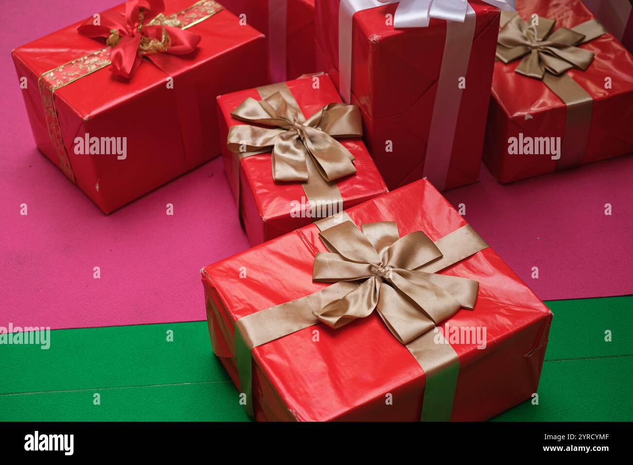 Red paper Christmas gifts Stock Photo - Alamy