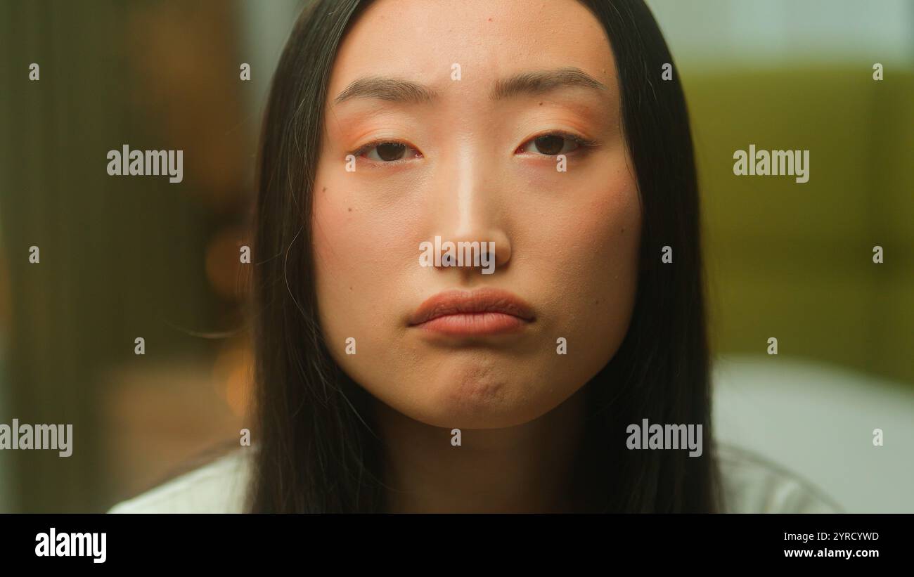 Upset sad frustrated Asian girl stress problem health unwell sick ...