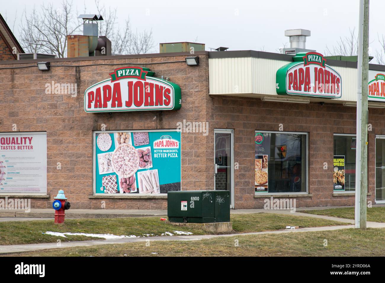 Niagara, CANADA - Feb 21 2024 : Papa John’s storefront sign on a brick ...
