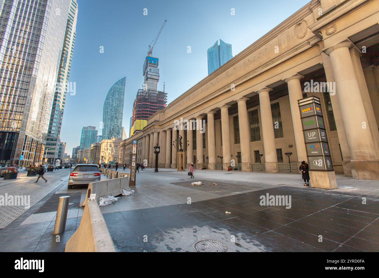 Daytime street view of Union Station in Toronto with iconic columns ...