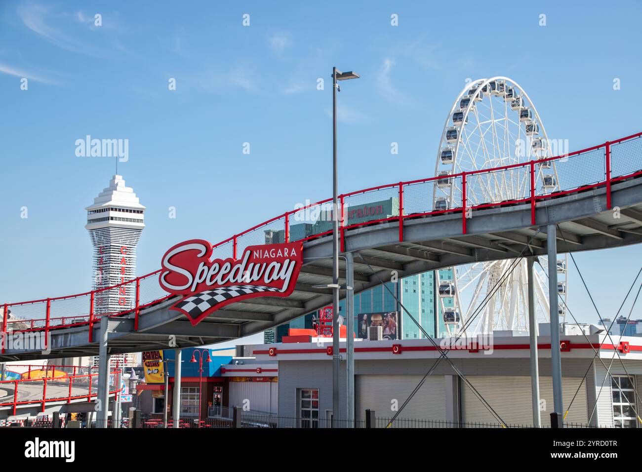 Niagara, CANADA - Feb 21 2024 : View of the Niagara Speedway go-kart track with a Ferris wheel ...
