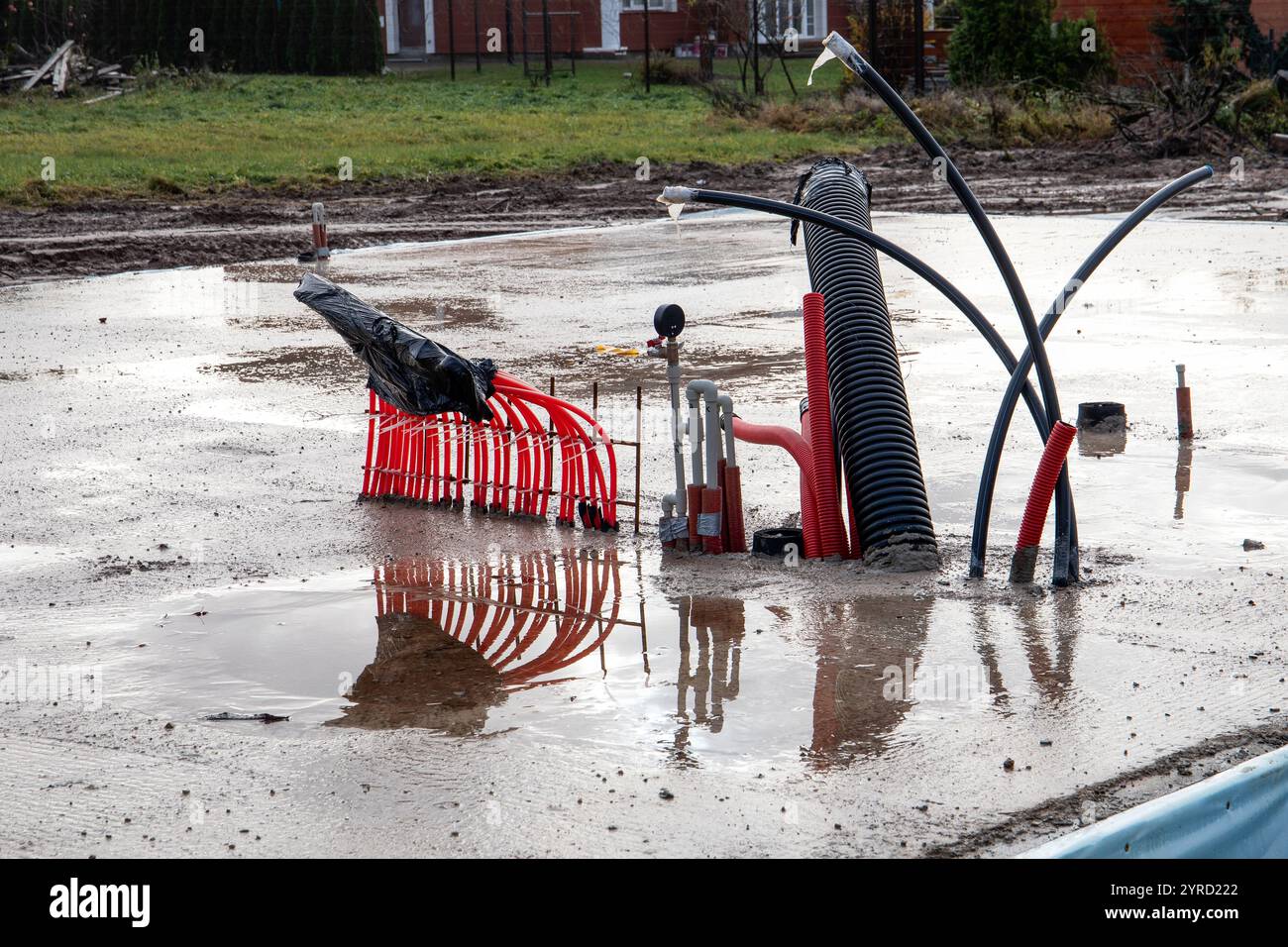 Building foundation slab and communications. Pipes for water ...