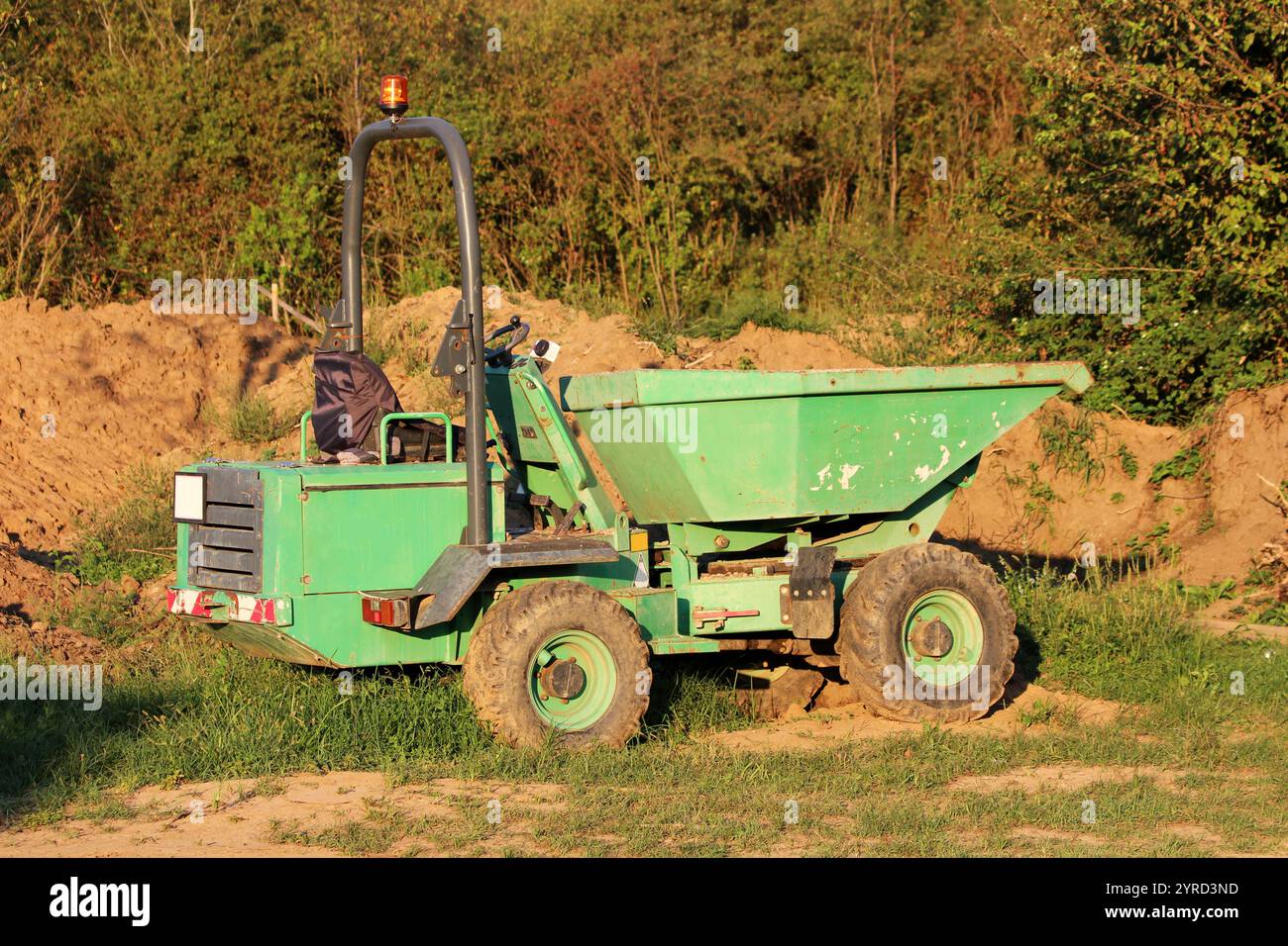 Used green forward tipping robust dumper with powerful engine at ...