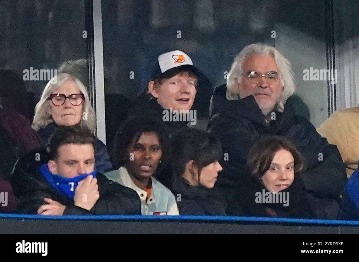 Singer songwriter Ed Sheeran (centre) with movie director Paul ...
