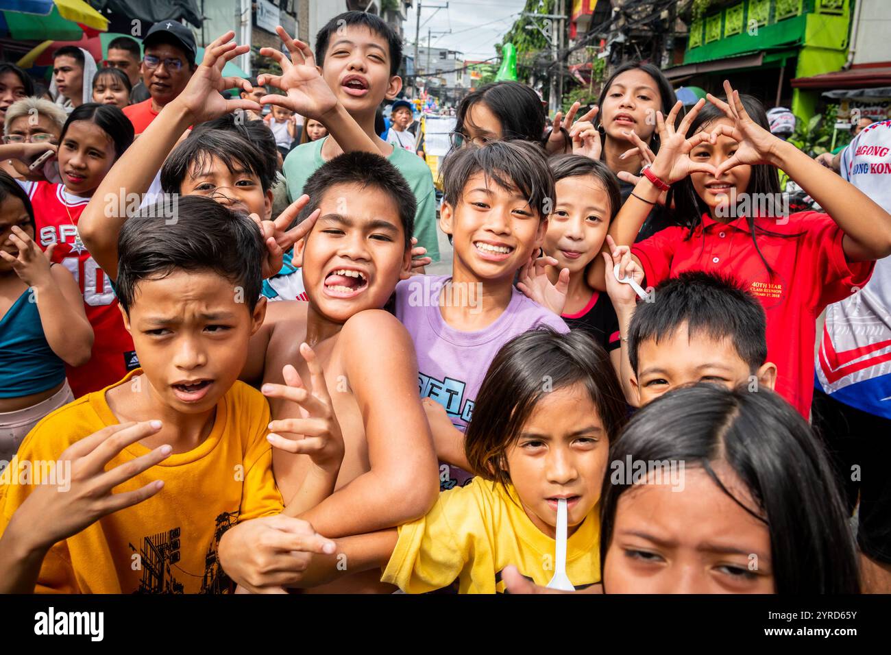 Crowds of cute Filipino children all happily pose and smile for the ...