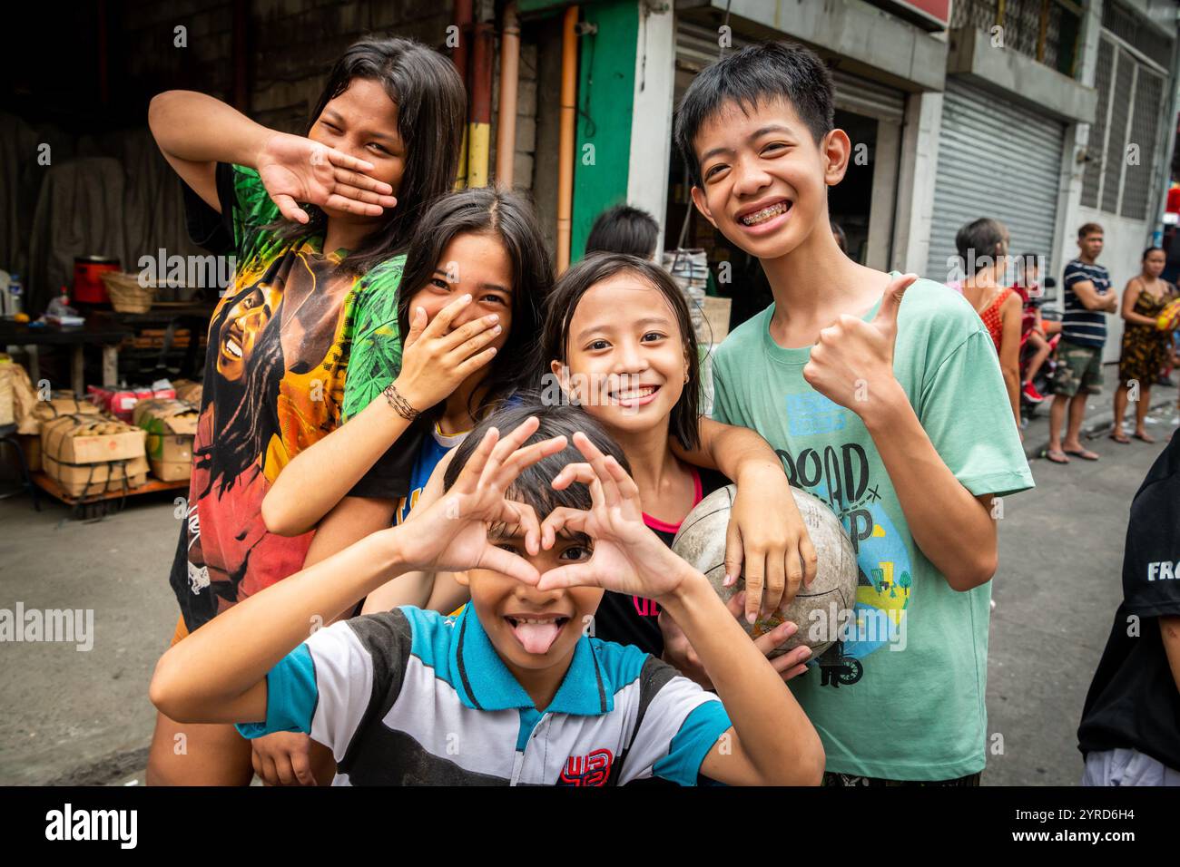 Crowds of cute Filipino children all happily pose and smile for the ...