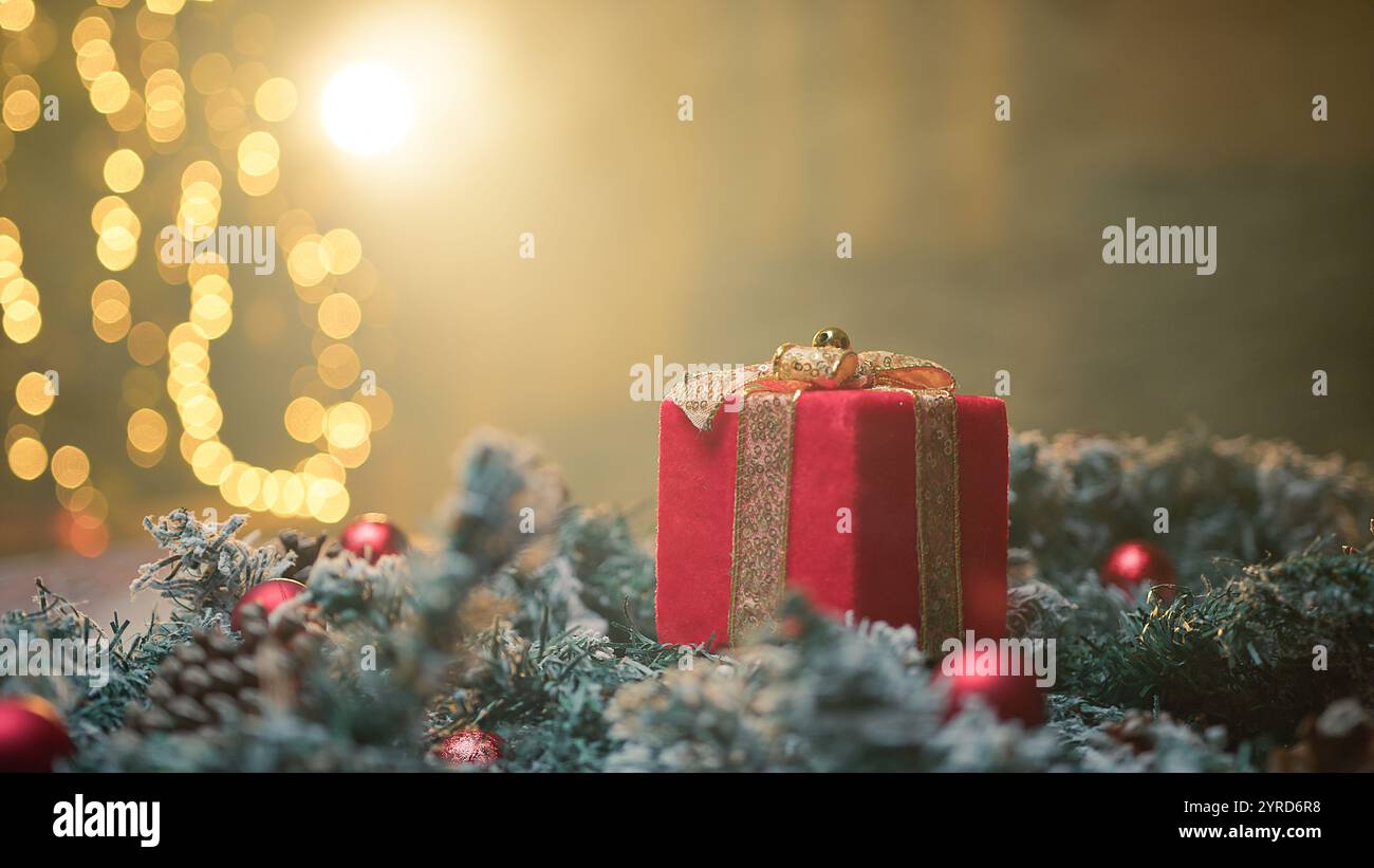 hand laying red gift for Christmas Stock Photo - Alamy