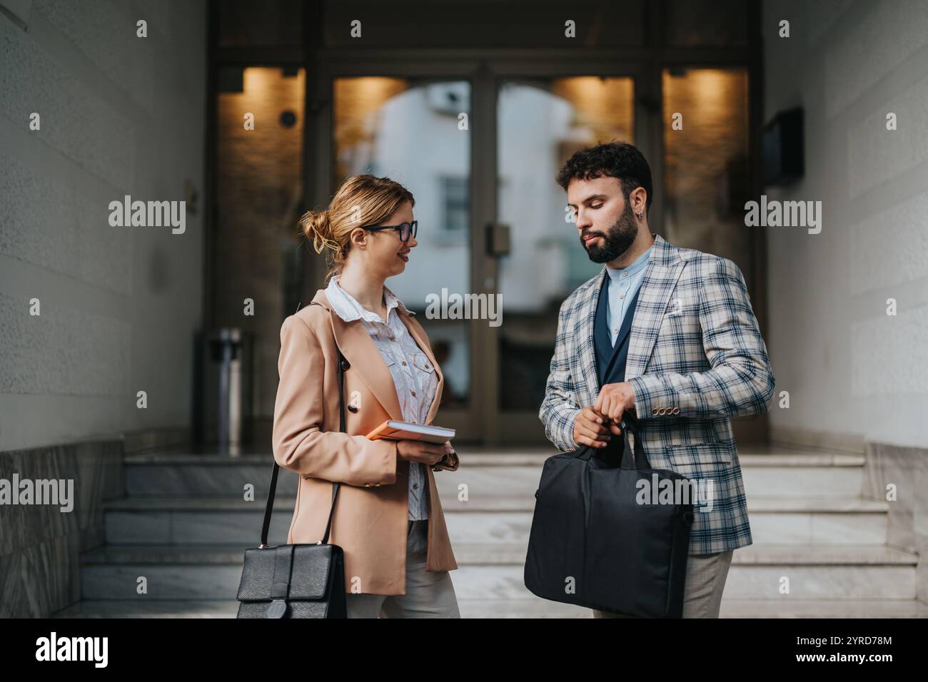 Professional business meeting between two colleagues outside office ...