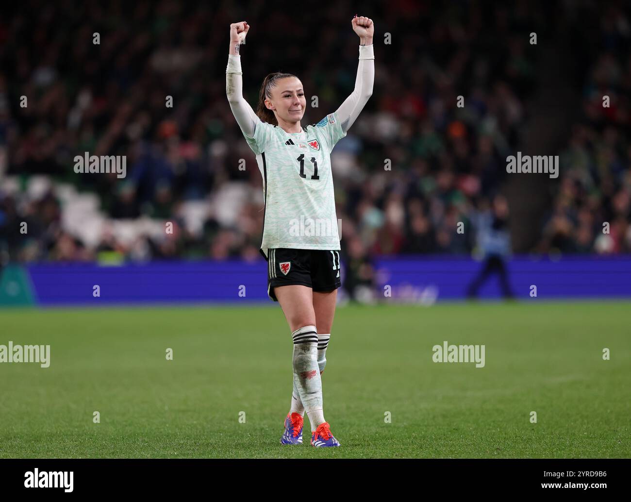 Wales' Hannah Cain celebrates after scoring the opening goal from a ...