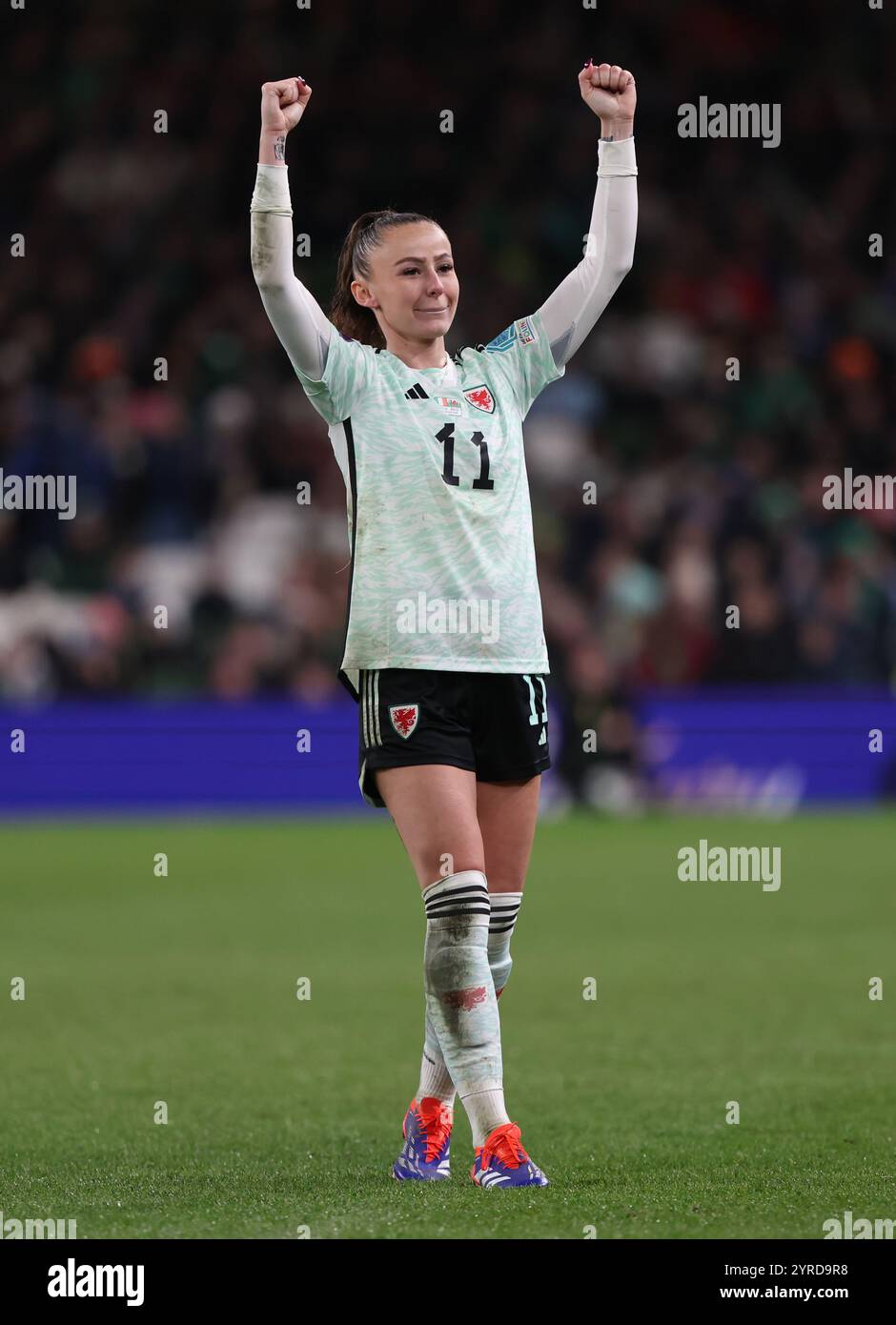 Wales' Hannah Cain celebrates after scoring the opening goal from a ...