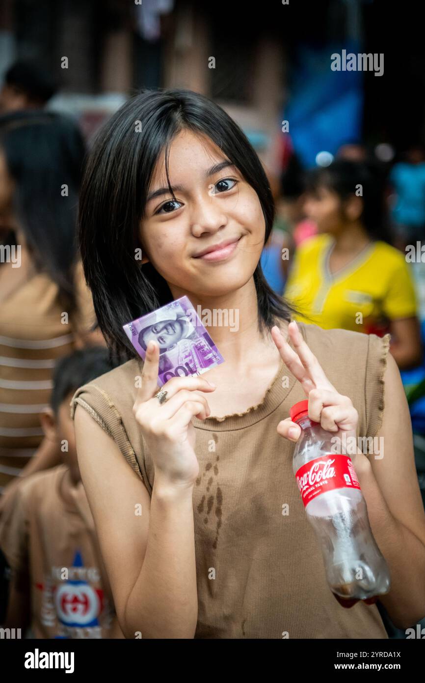 A young pretty filipino girl makes a pose for her portrait Stock Photo ...