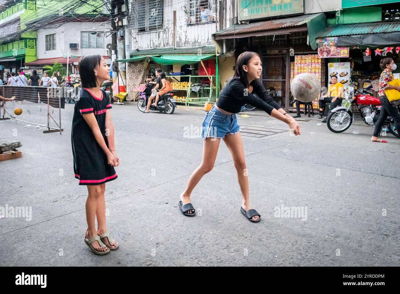 Cute Filipino children play volleyball in the street in The Tondo ...