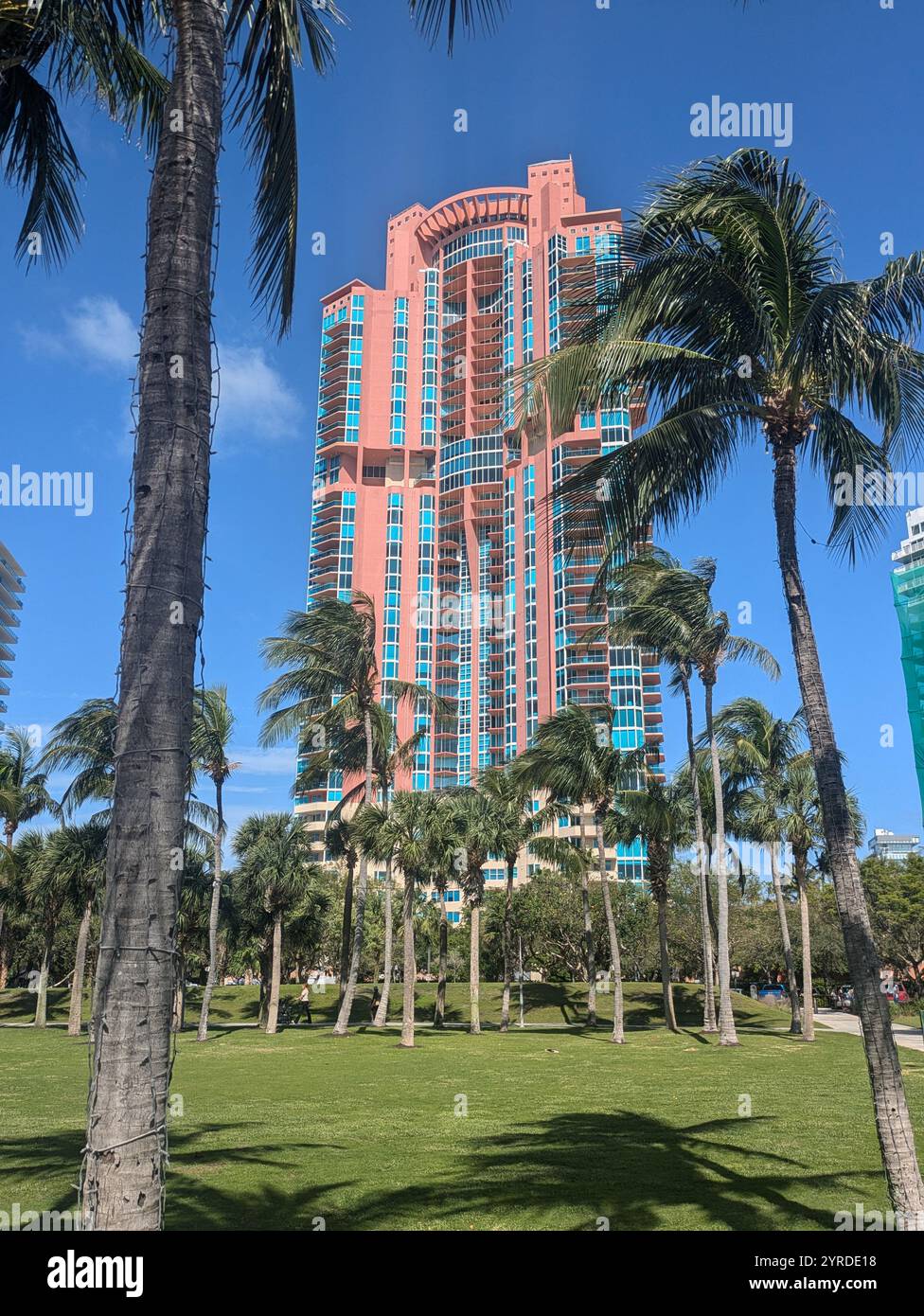 Pink and green sky scraper in Miami Beach Stock Photo - Alamy