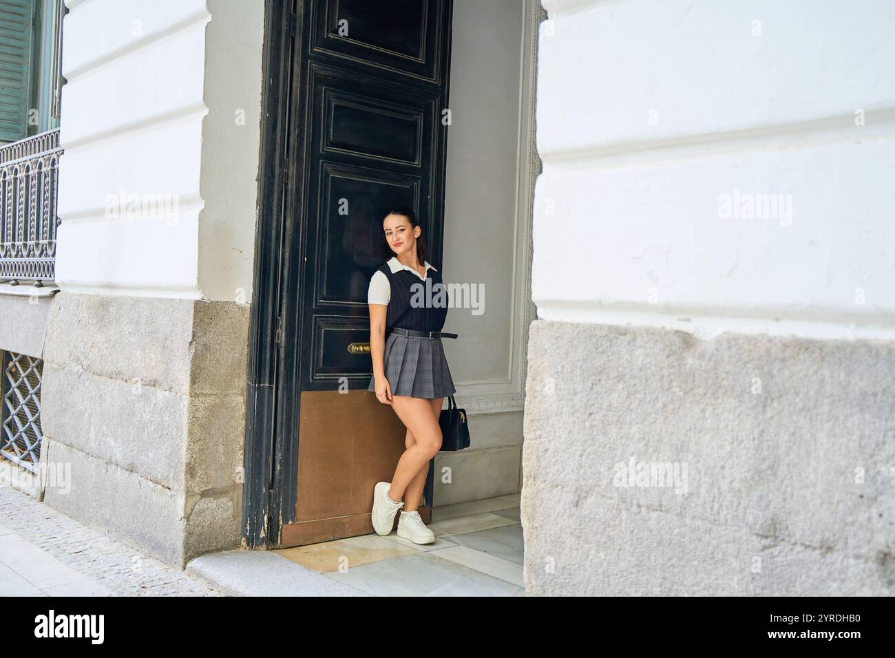 Woman posing in doorway hi-res stock photography and images - Alamy