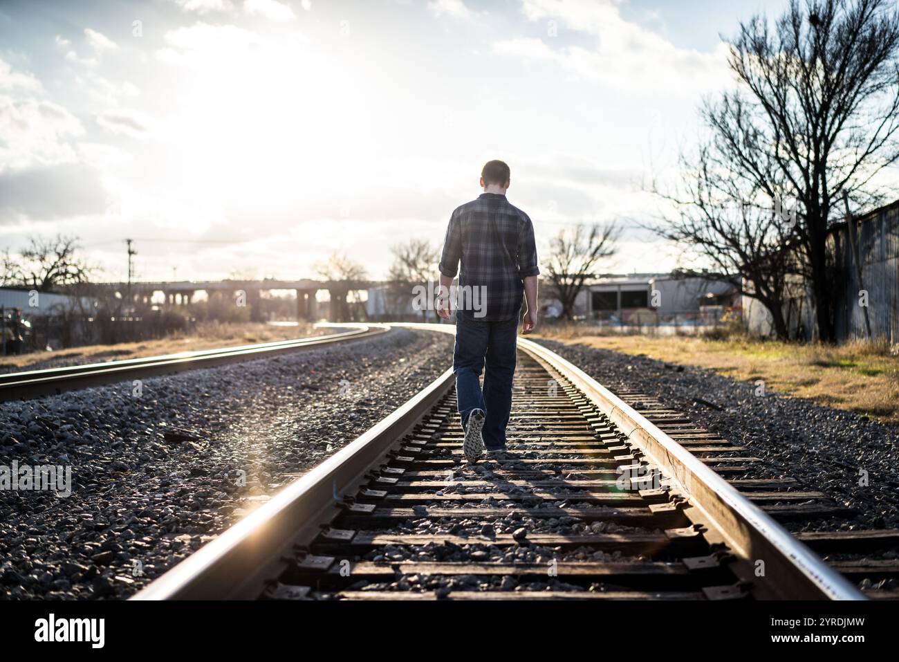 Boy walking train tracks hi-res stock photography and images - Alamy