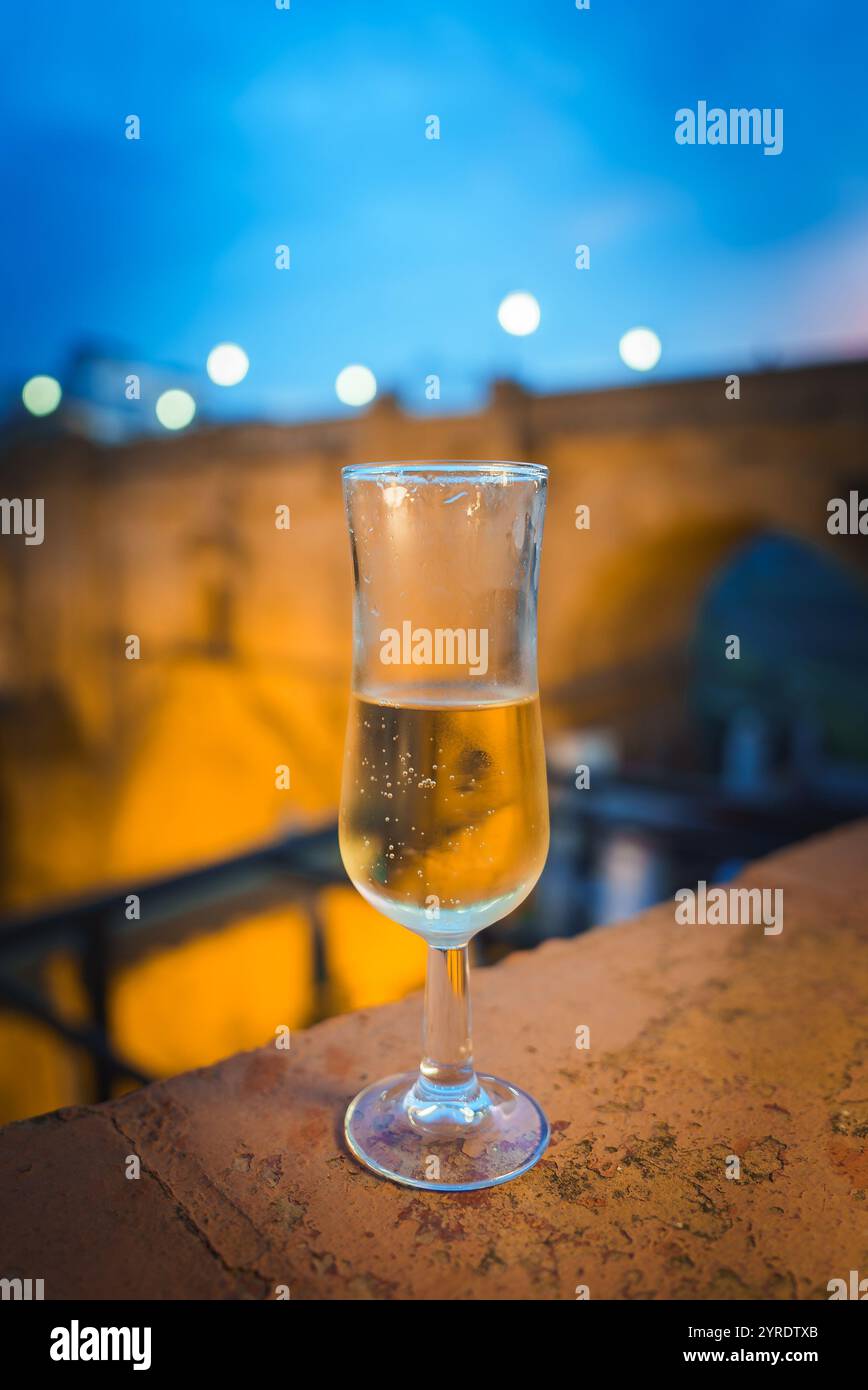 Champagne Glass on Terracotta Surface with Warm Ambient Lighting Stock ...