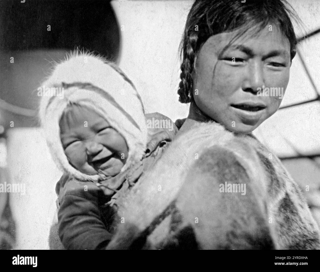 Vintage Inuit Portrait: Woman carrying a baby in her amauti, circa 1922 ...