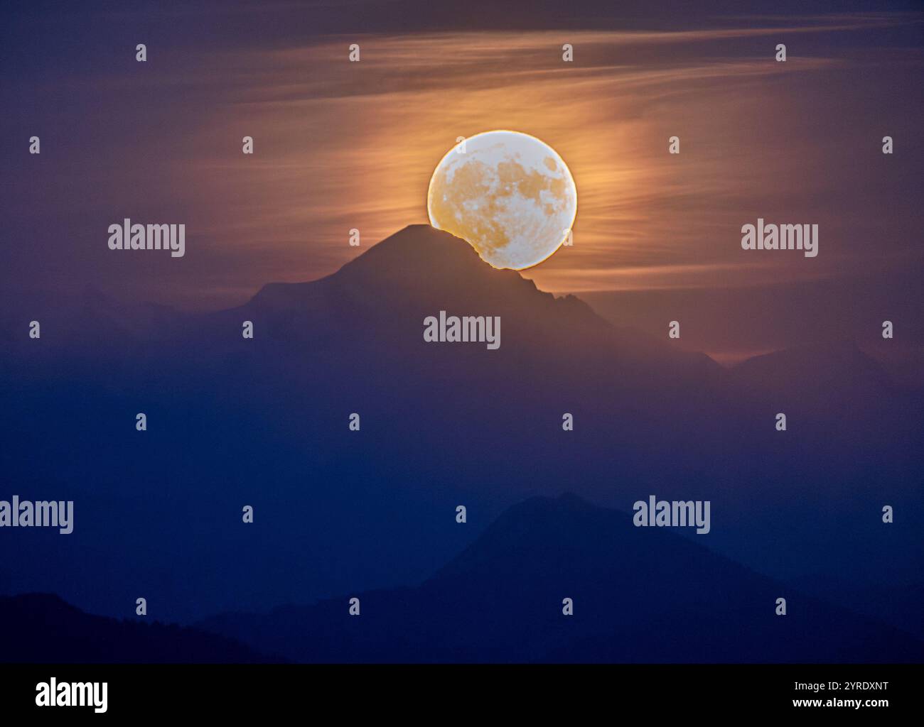 Overexposed full moon rising behind Mont Blanc Stock Photo - Alamy