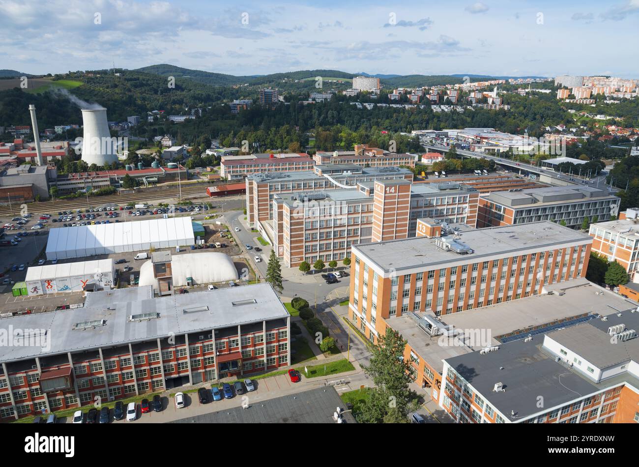 Spacious industrial area with multi-storey factory buildings surrounded ...