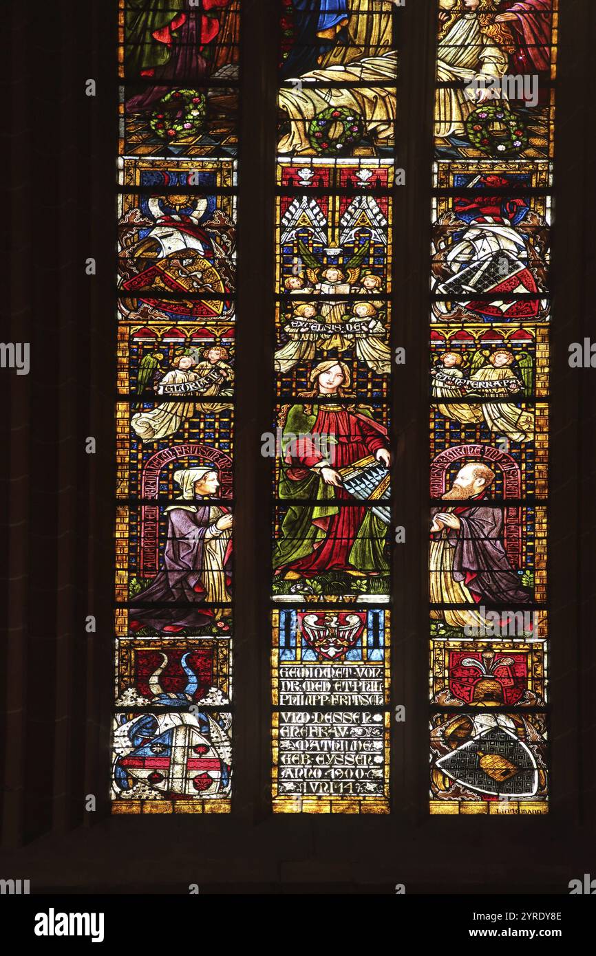 Colourful stained glass window by Alexander Linnemann 1901 with patron ...