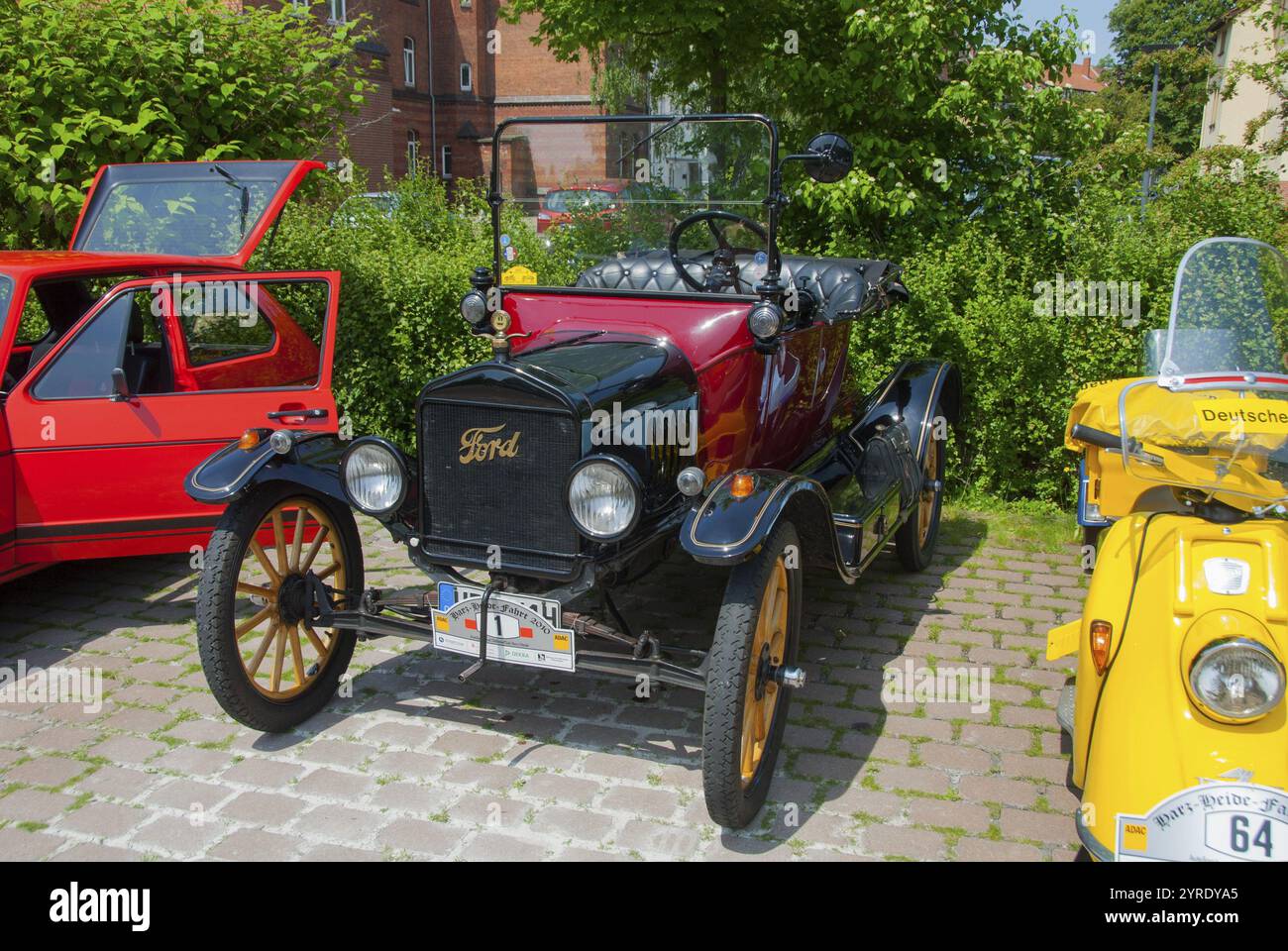 Red and black historic Ford in a sunny car park, Ford T-Model Torpedo ...
