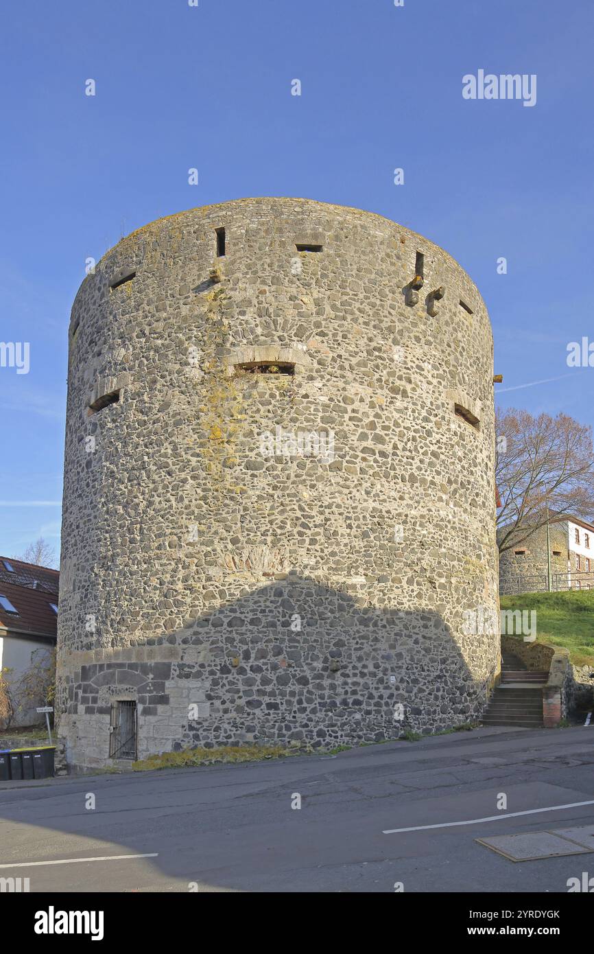 Thick tower as part of the historic town fortifications, castle complex ...