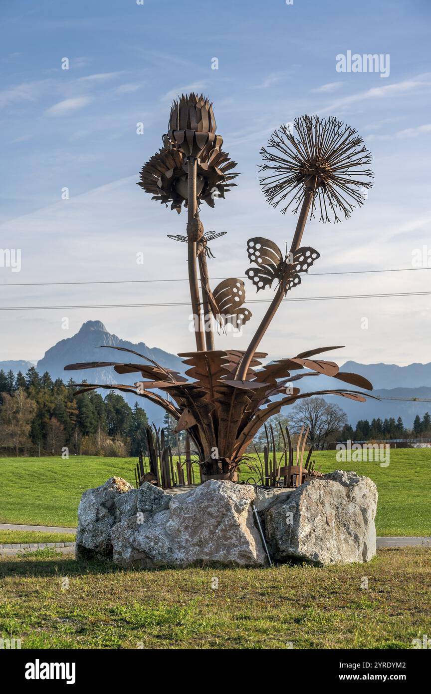 Art object with metal plants and butterflies at the roundabout near ...