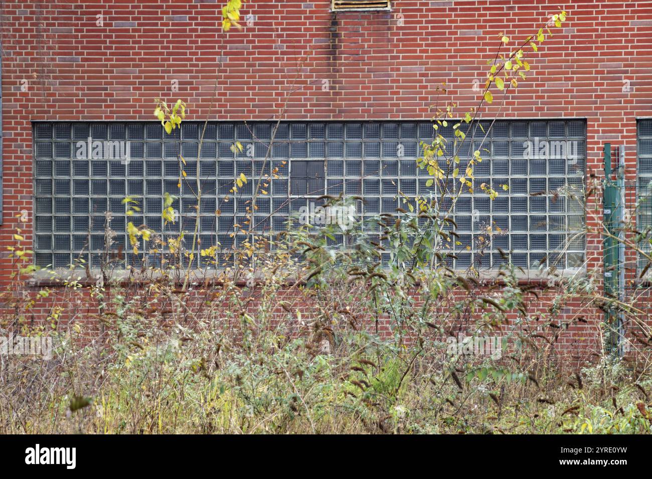 Old window in a brick wall of an industrial old buiding Stock Photo - Alamy