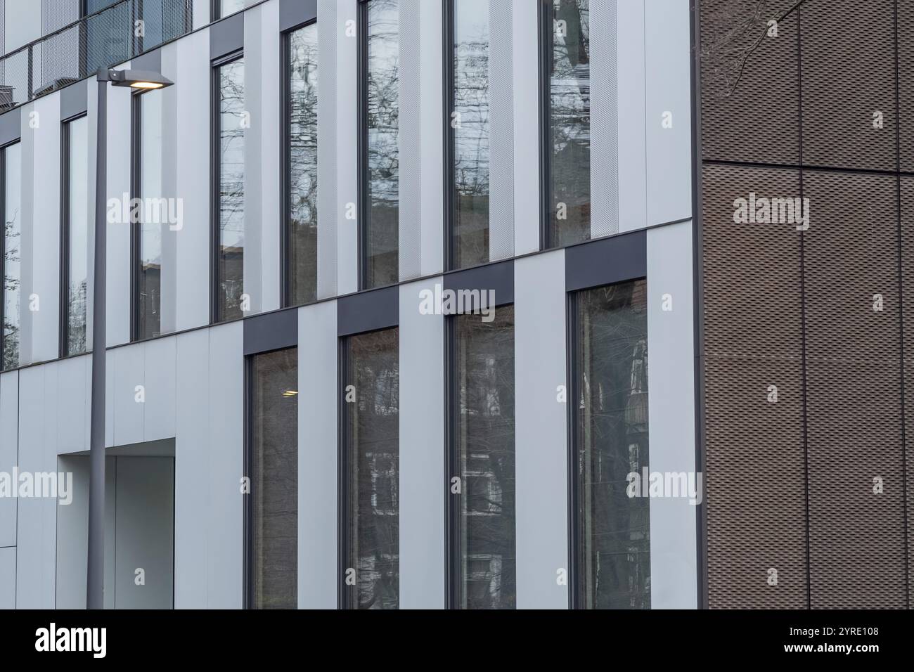 Facade of an modern large house, wall with windows Stock Photo - Alamy