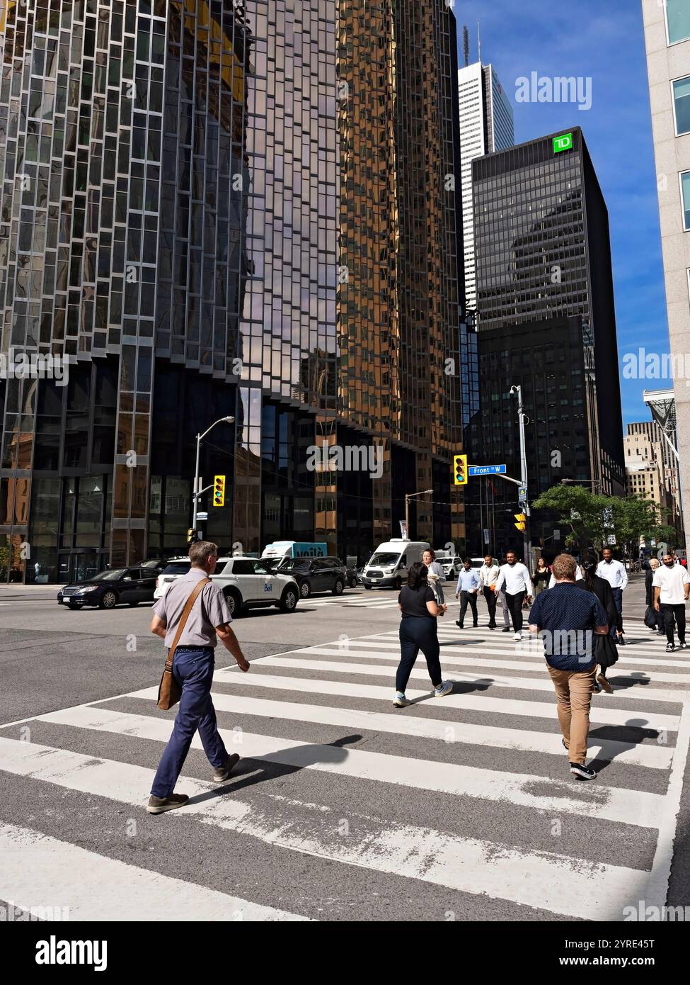 Toronto Canada / Pedestrians walk accross the intersection of Bay ...