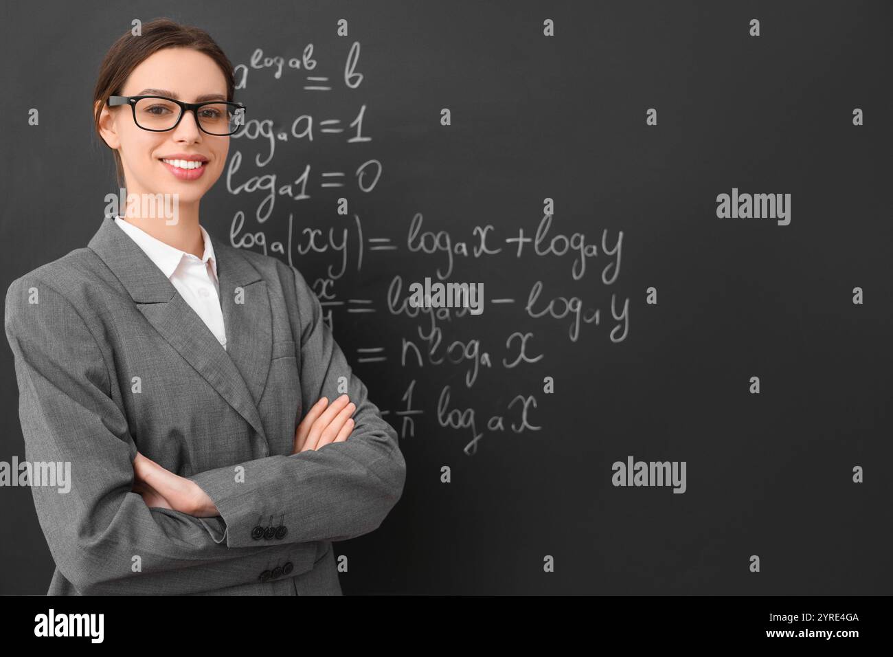 Female math teacher chalkboard hi-res stock photography and images - Alamy