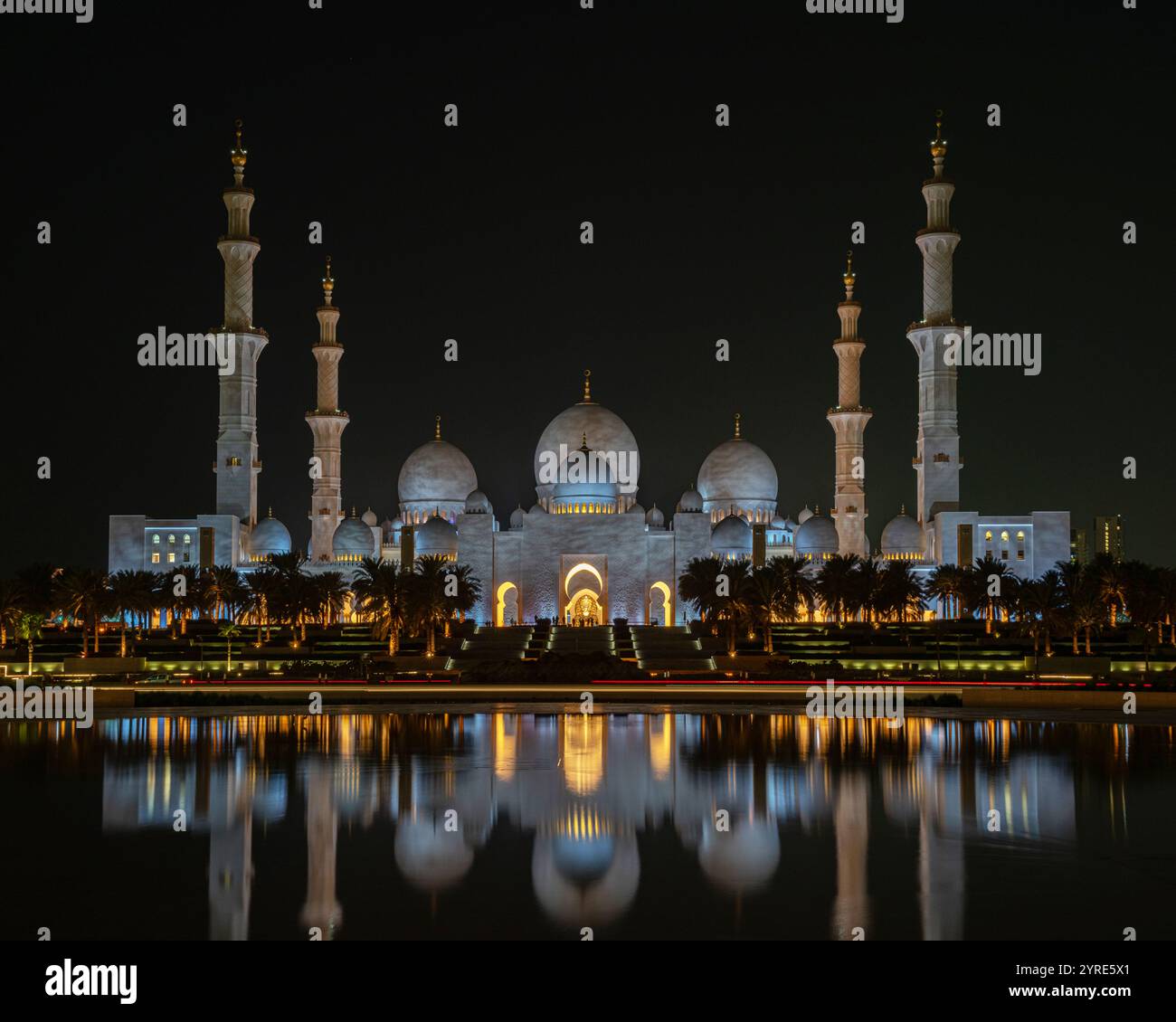 Sheikh Zayed Grand Mosque illuminated at night, its stunning ...